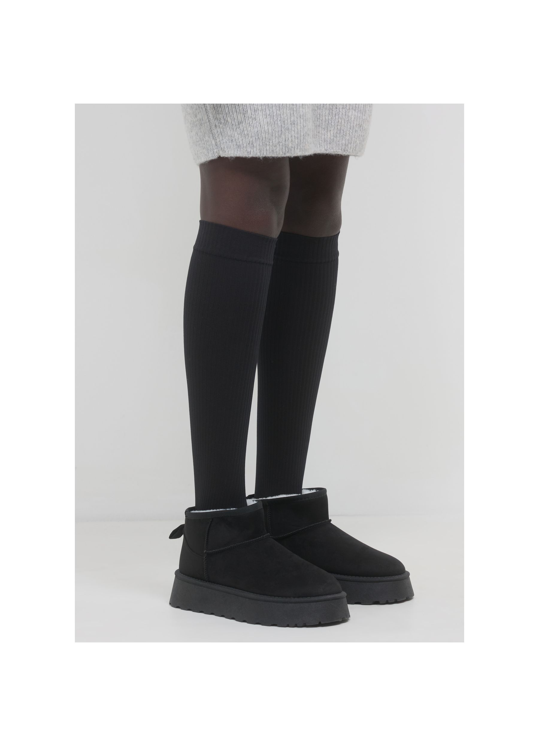 Bottines à semelles compensées en fausse fourrure ultrablack | Calliope